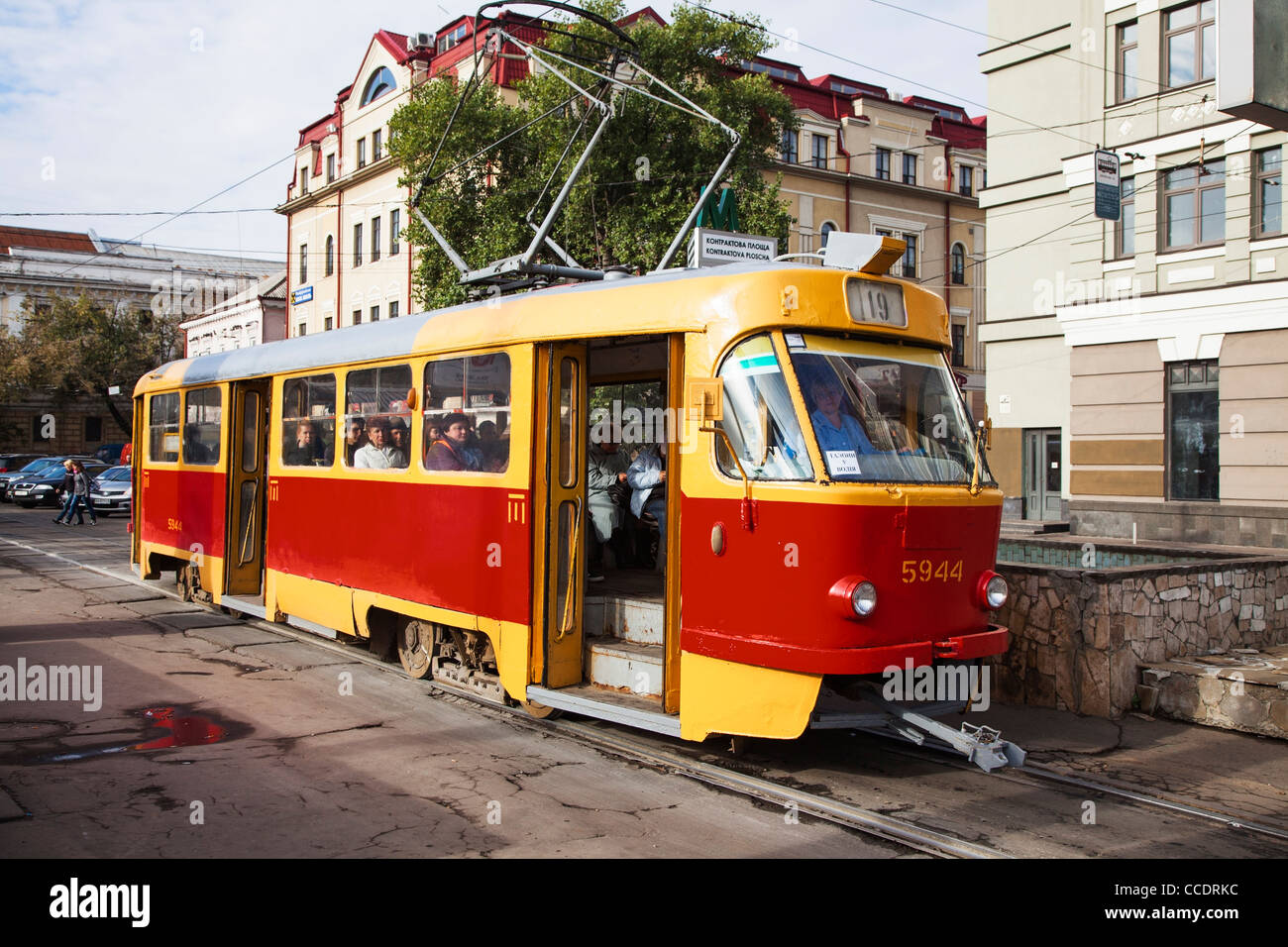 Yellow and red tram in Podil, Kiev, Ukraine, eastern Europe Stock Photo ...