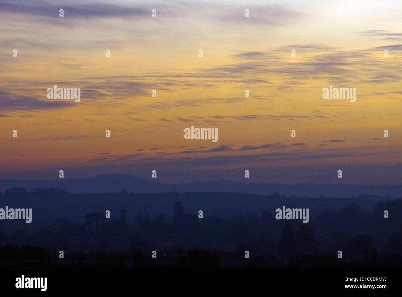 Sunset Haldon Hill and Dartmoor from Exeter city centre. Exeter, Devon ...