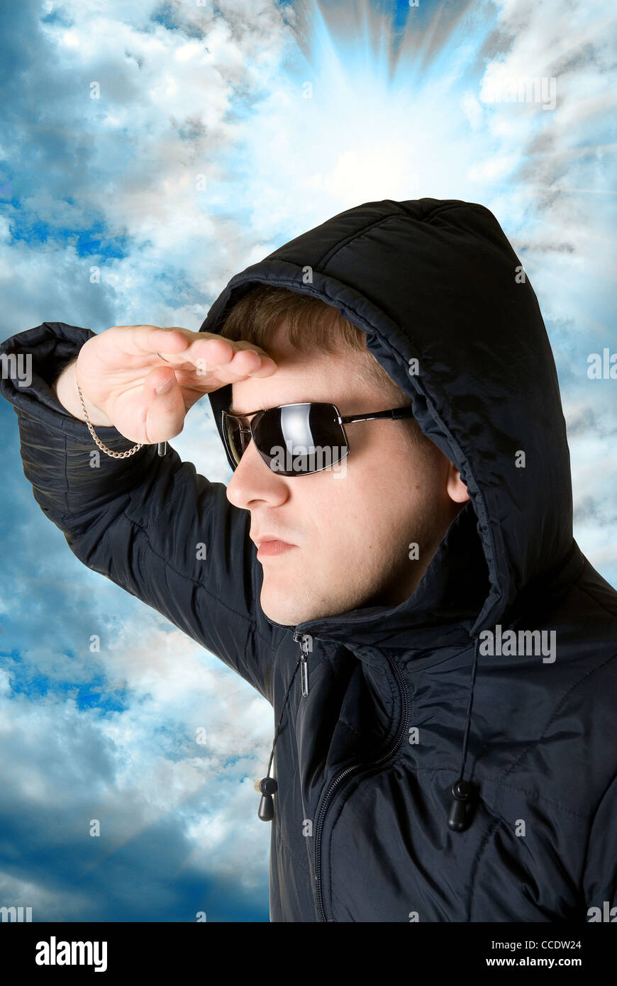 Young boy staring in to the distance hi-res stock photography and ...