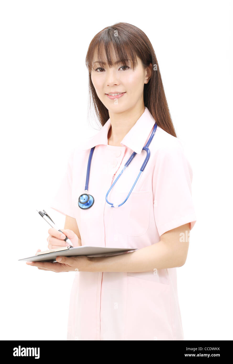 Young Asian female nurse holding a medical chart Stock Photo - Alamy