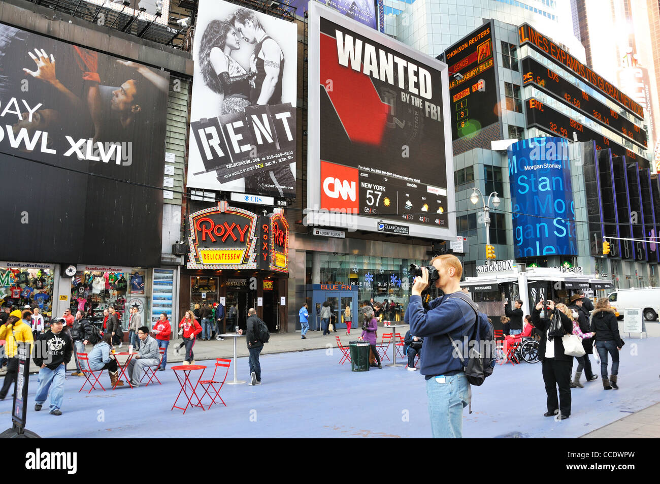 Tourist taking photos, Times Square, New York, USA Stock Photo - Alamy