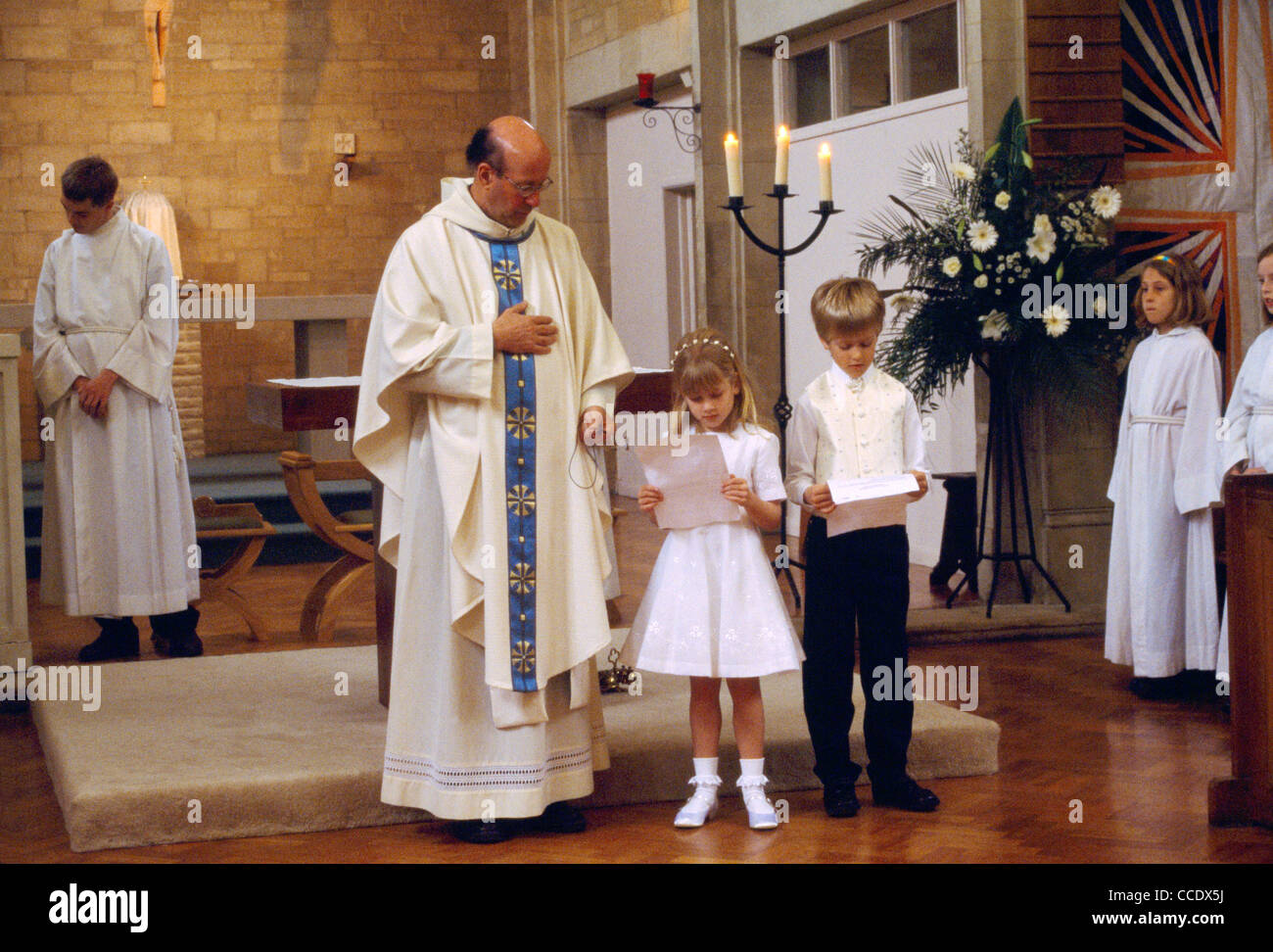 St Bernard's Catholic Church First Communion Children Reading Stock ...