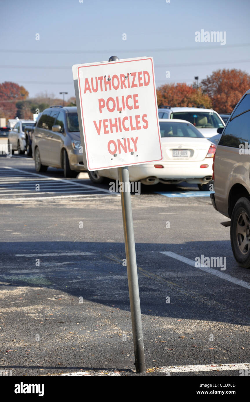 Authorized police vehicles only sign in parking lot, USA Stock Photo ...