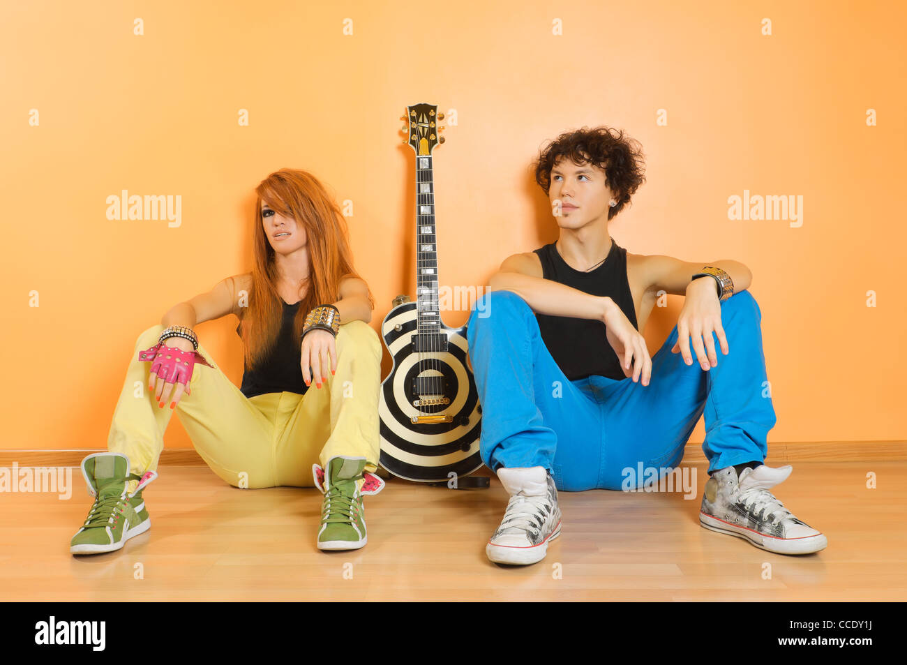 Two rock band members relaxing at the studio Stock Photo - Alamy