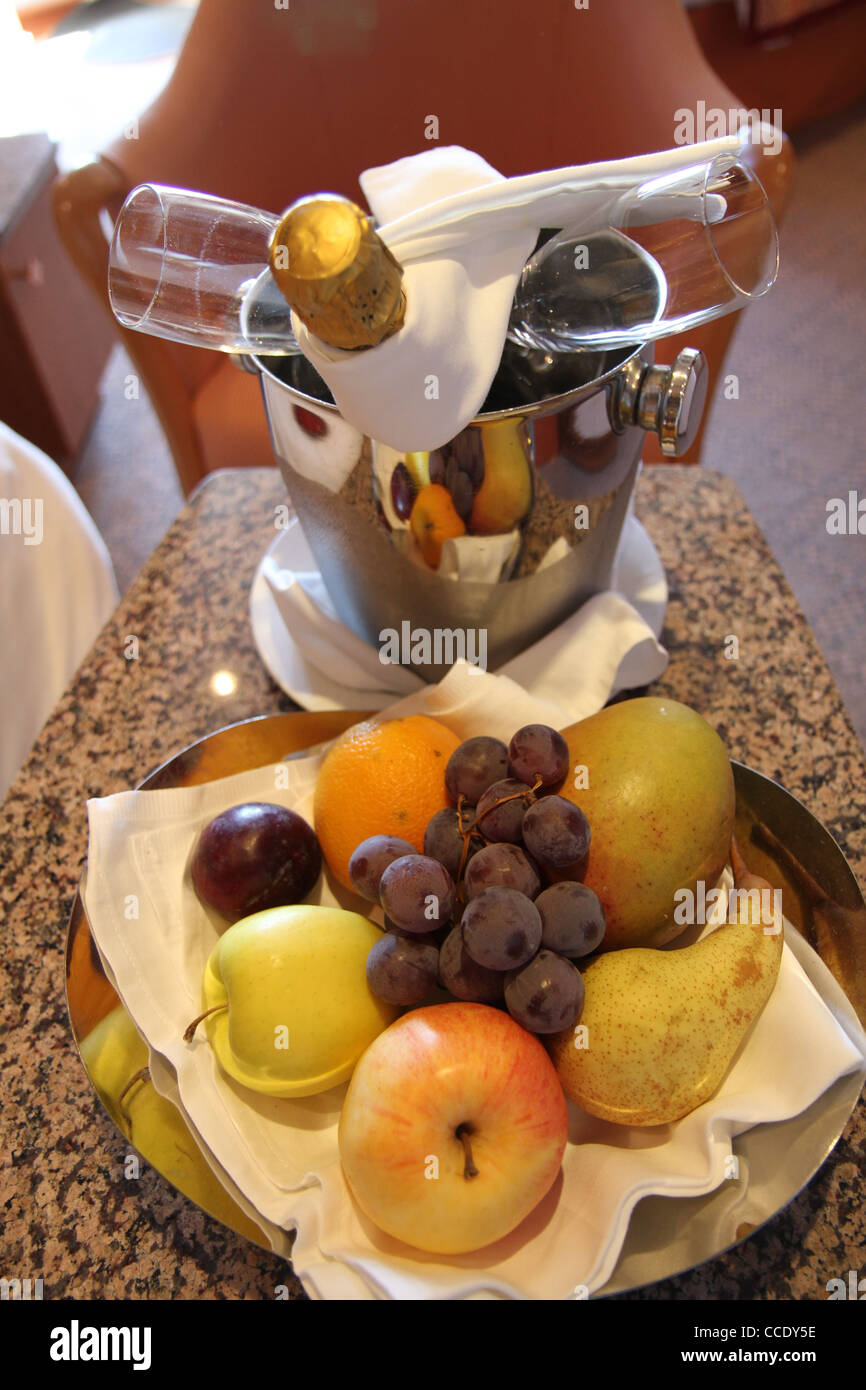 A display of champagne and fruit bowl Stock Photo - Alamy
