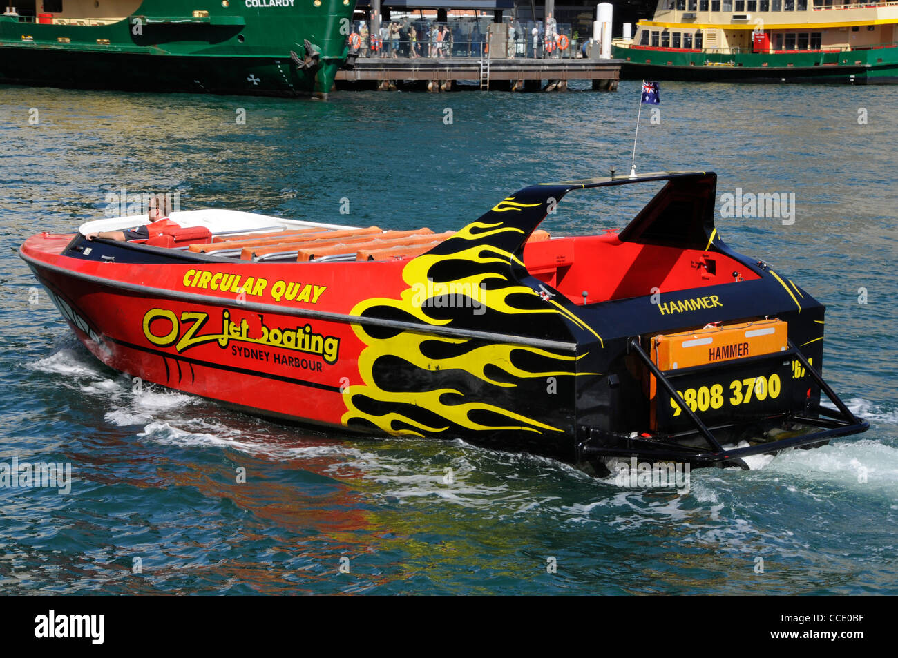 A tourist high-speed fun boat approaching Circular Quay in Sydney, New ...