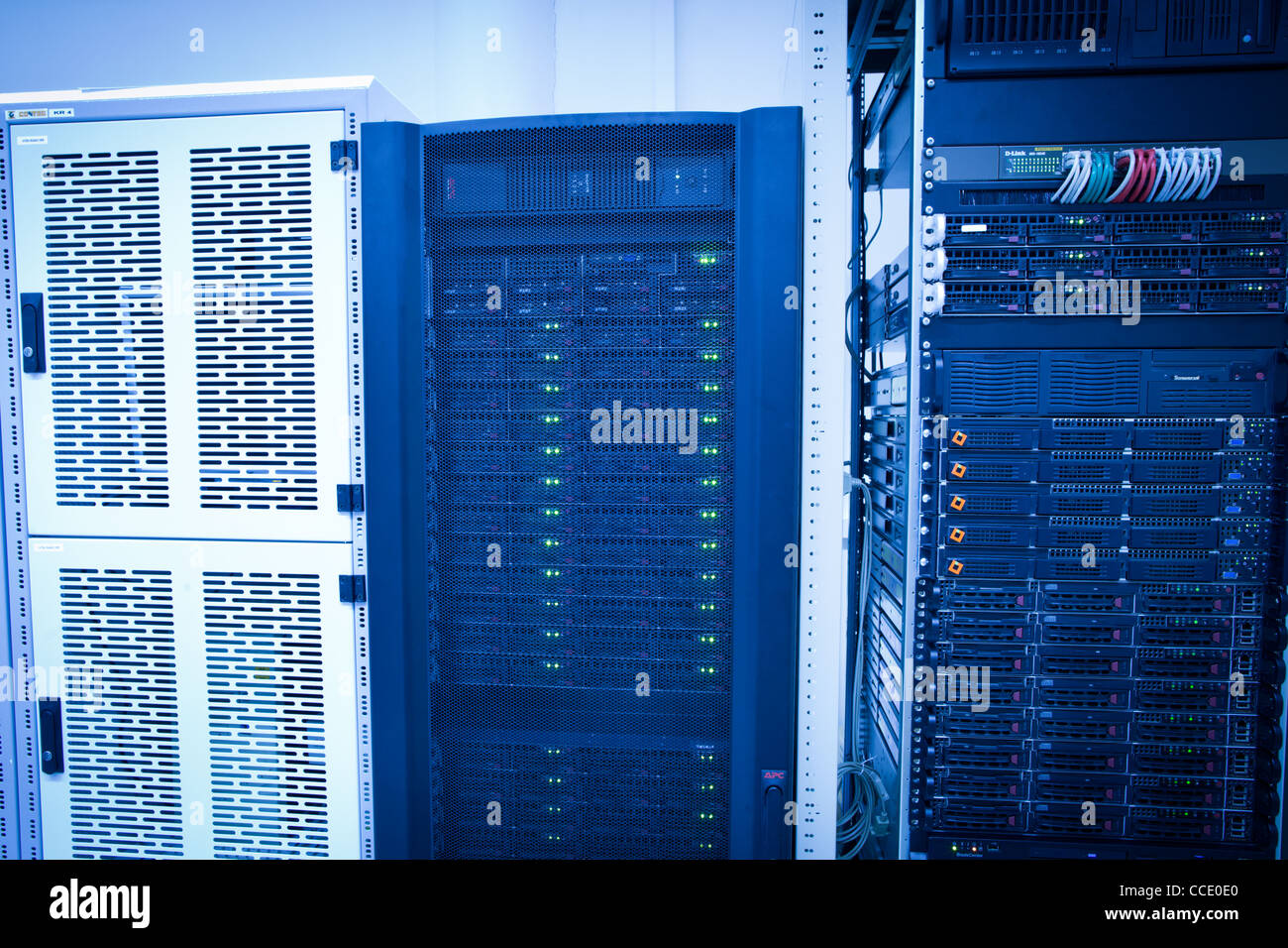 Server rack cluster in a data center (shallow DOF; color toned image ...