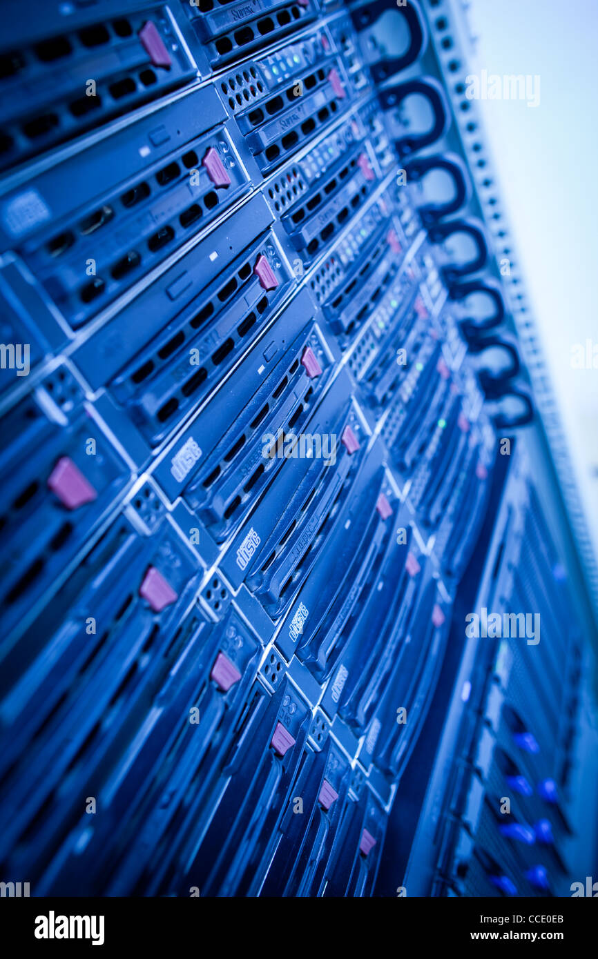 Server rack cluster in a data center (shallow DOF; color toned image ...