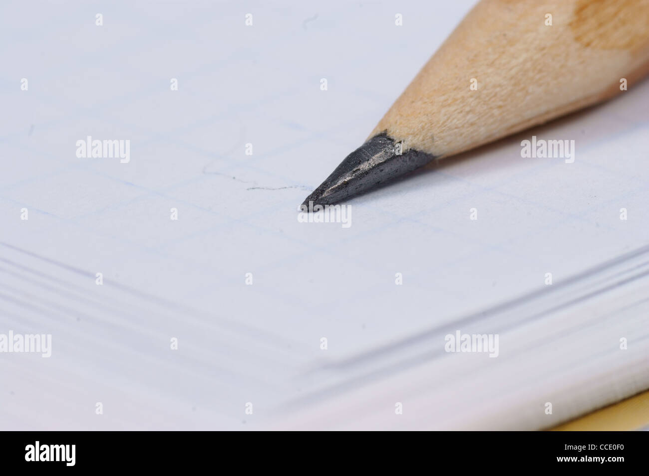 empty notebook and pencil isolated on white background Stock Photo - Alamy