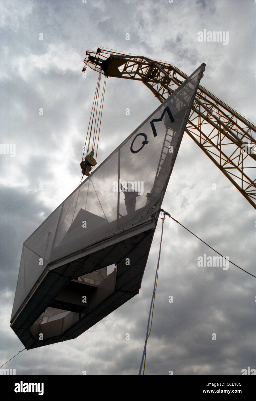 Sculptor George Wyllie's Paper boat is craned into the water at the ...