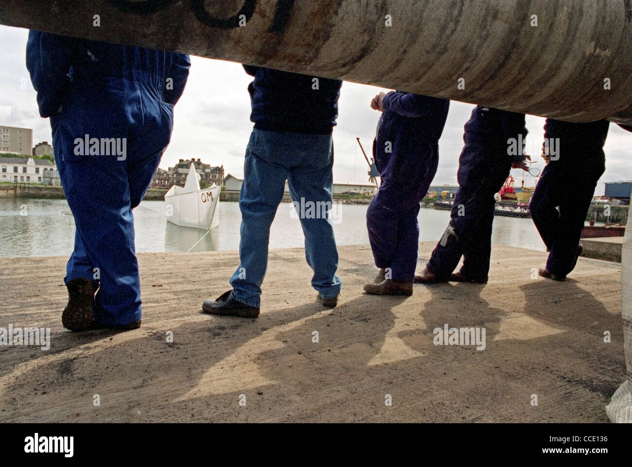 Sculptor George Wyllie's Paper boat is craned into the water at the ...
