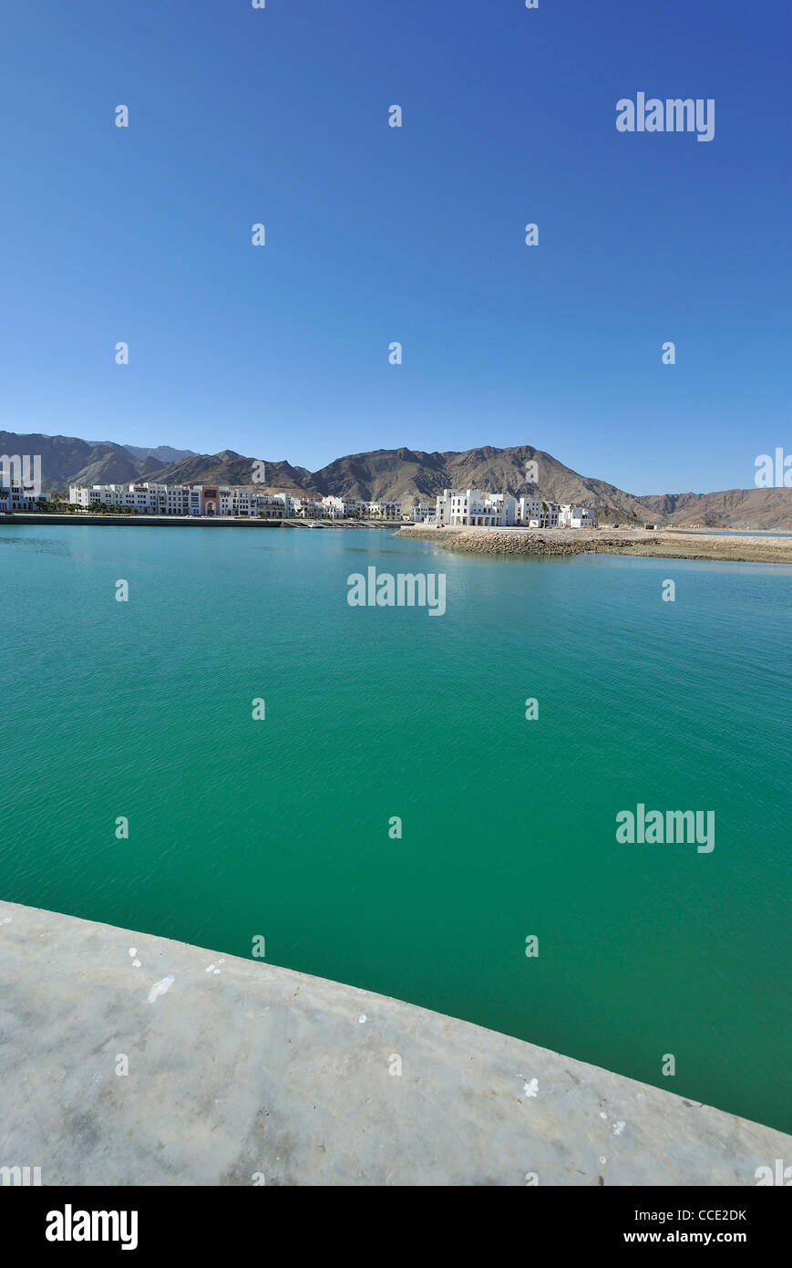 The huge new marina and housing complex at Jebel Sifah with the ...