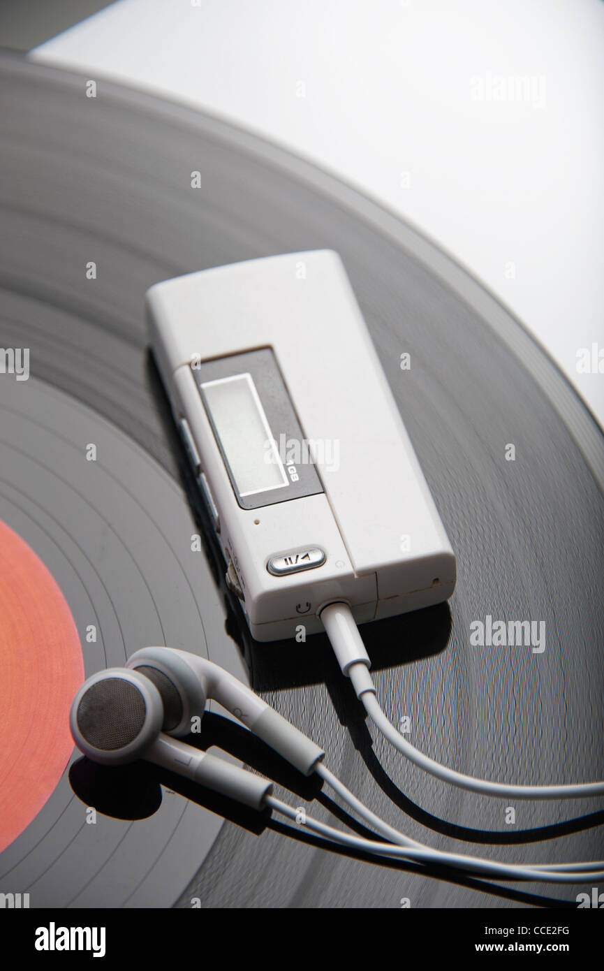MP3 player on a vinyl record Stock Photo - Alamy