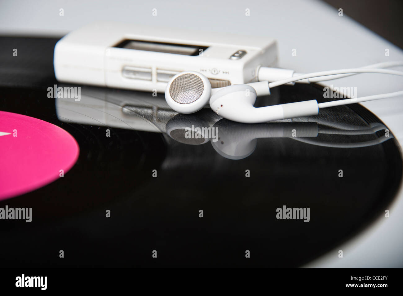 MP3 player on a vinyl record Stock Photo - Alamy