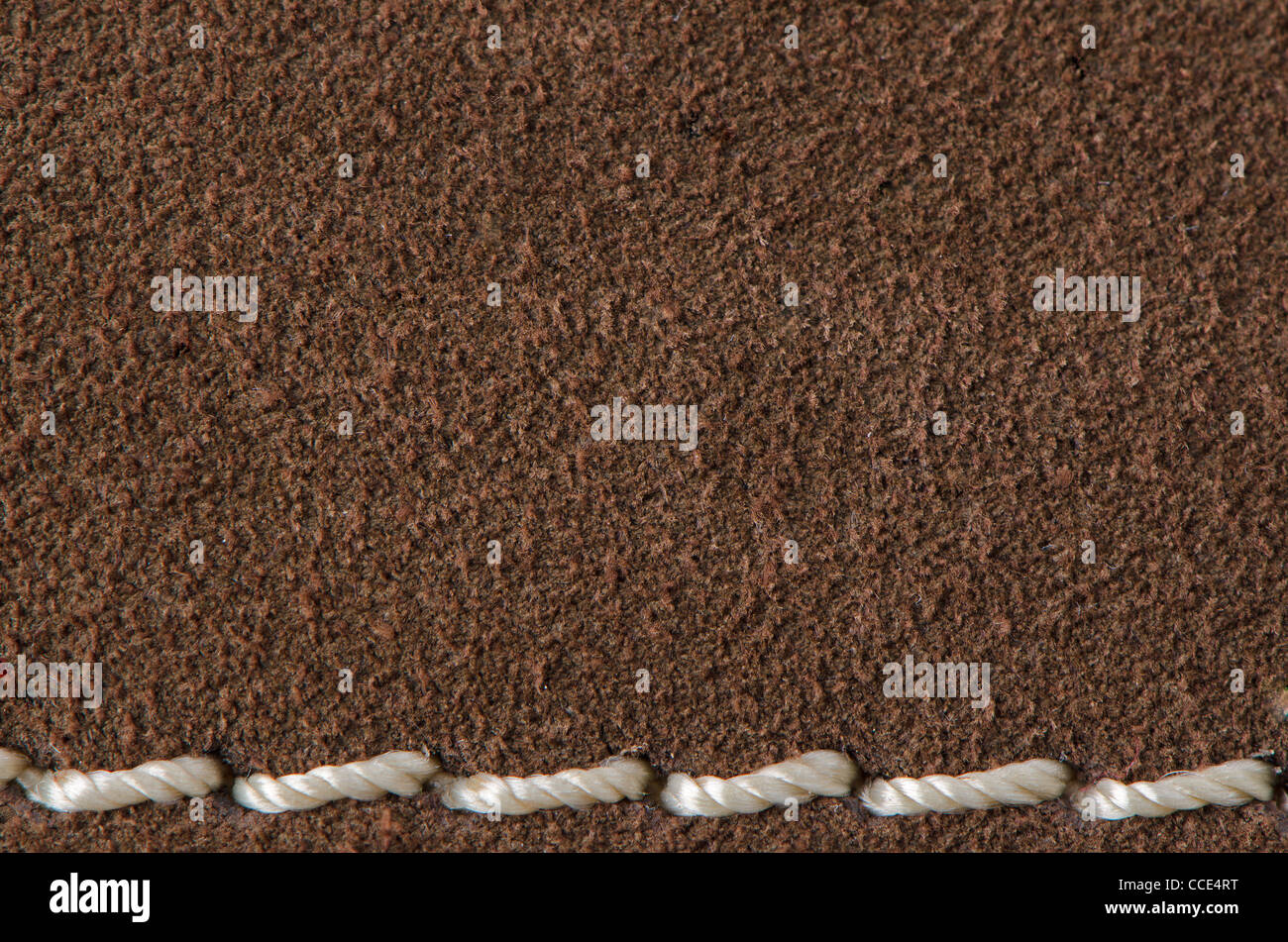 Brown leather with seam, stitch background Stock Photo - Alamy