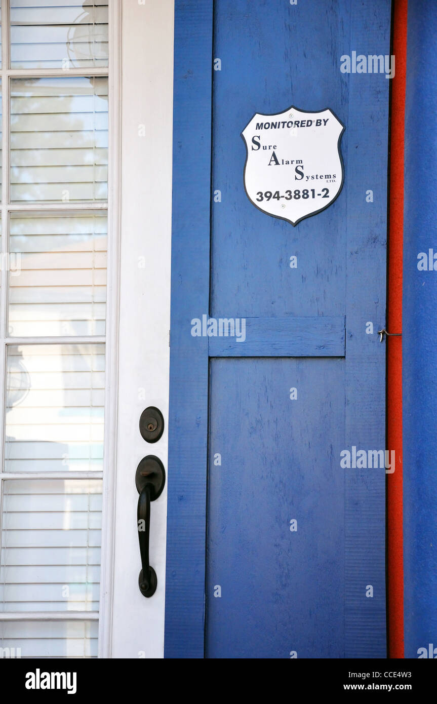Alarm system warning sign for thieves on residential home door Stock ...