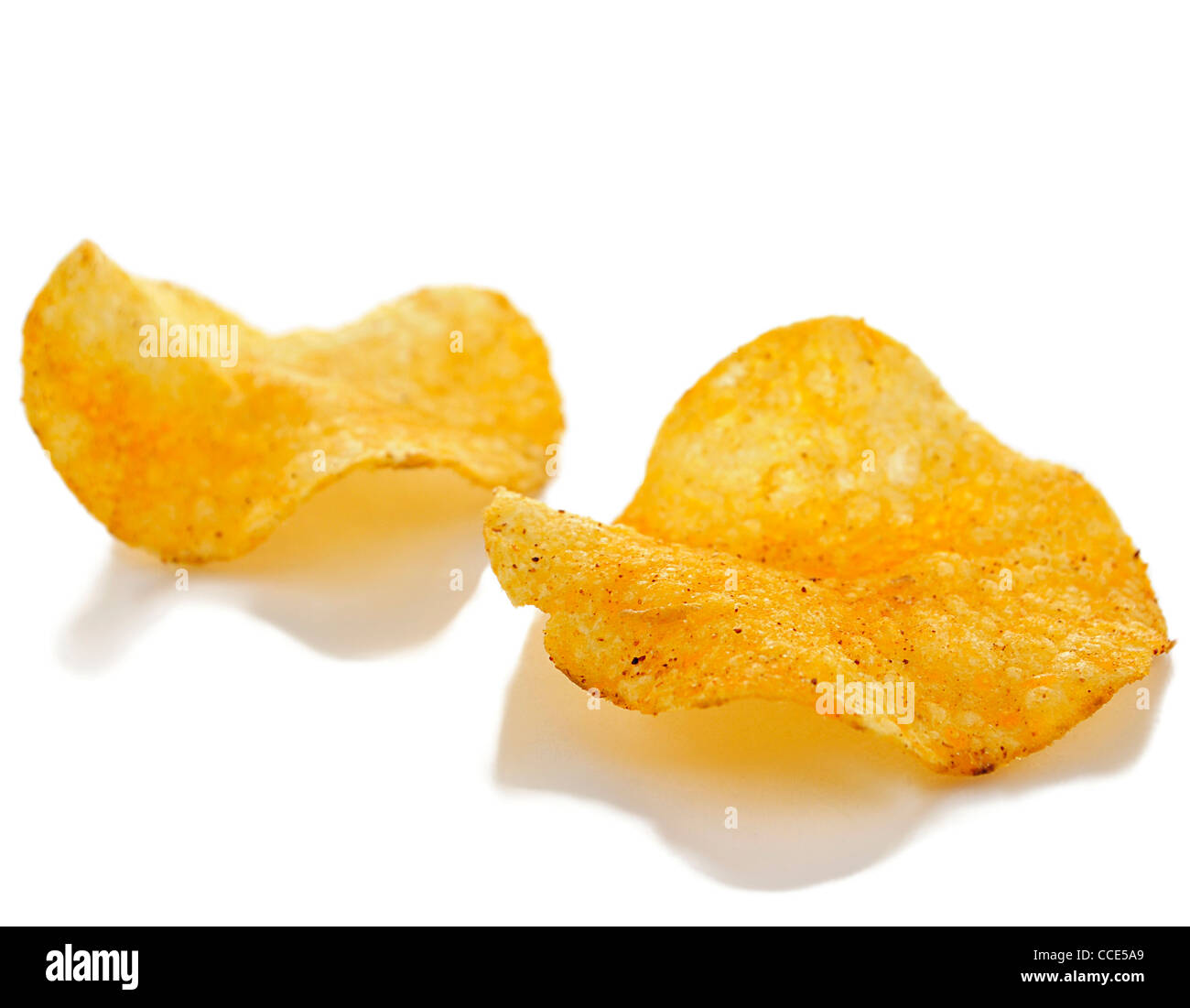 potato chips on white background Stock Photo - Alamy
