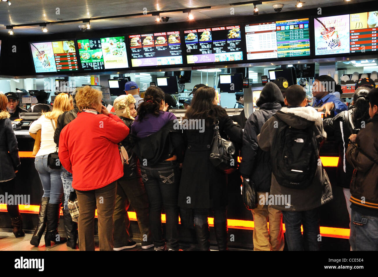 People waiting in line at Macdonald's fast food restaurant, New York ...