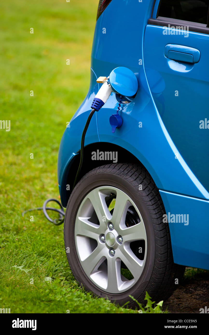 Ecological modern electric car filling Stock Photo - Alamy