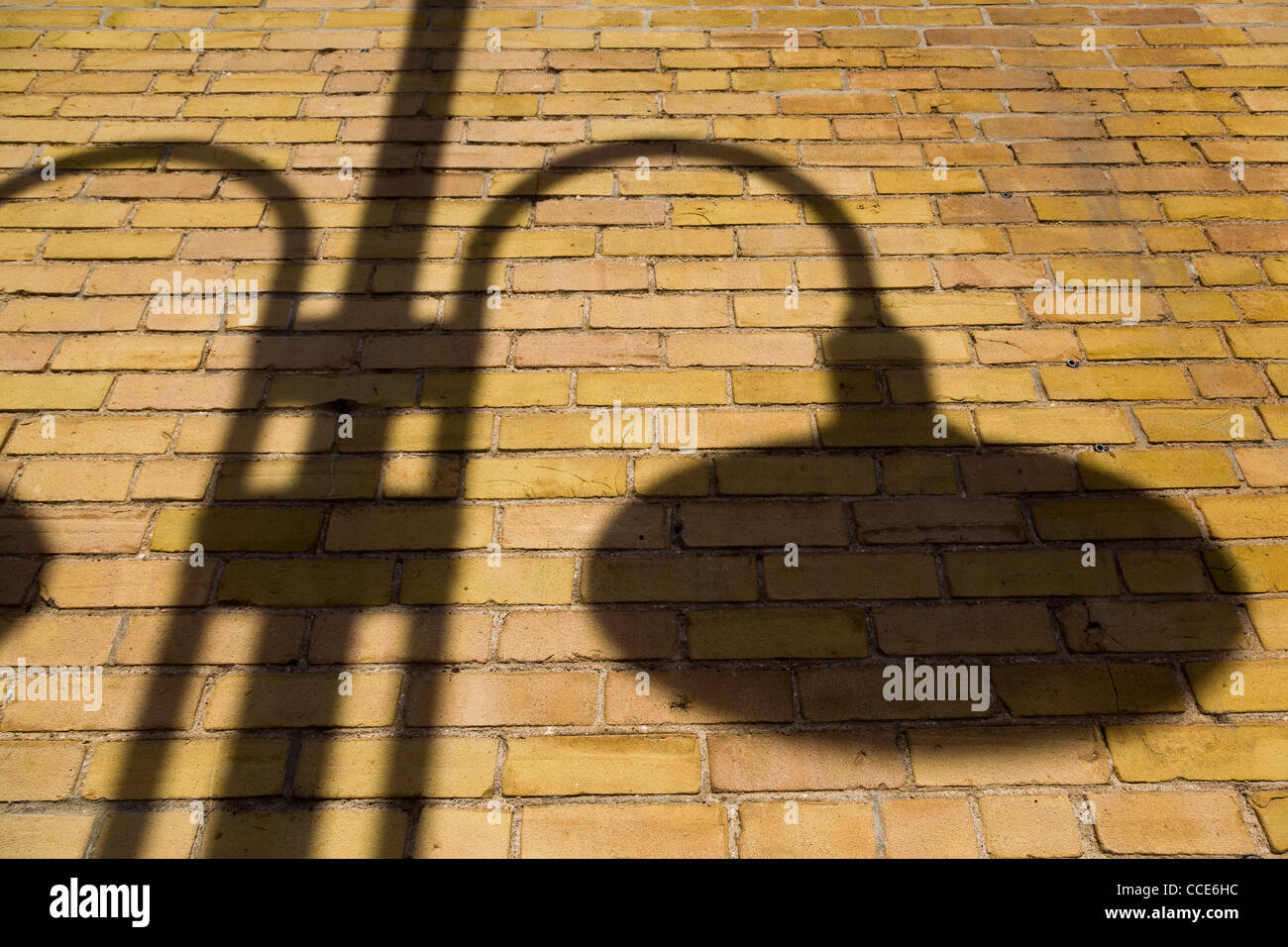 Street lamp shadow on brick wall Stock Photo - Alamy