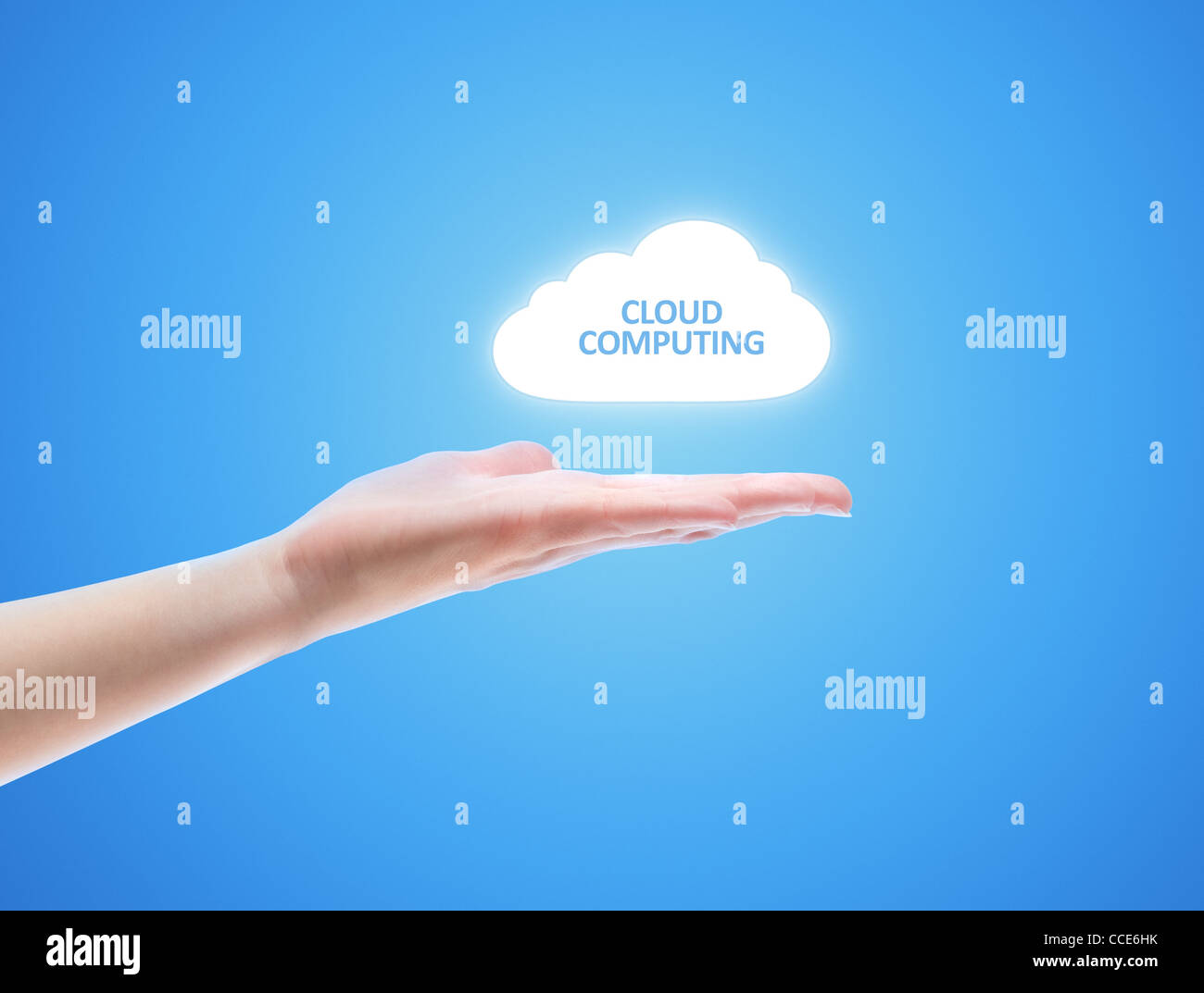 Woman hand share the cloud against blue background. Concept image on ...