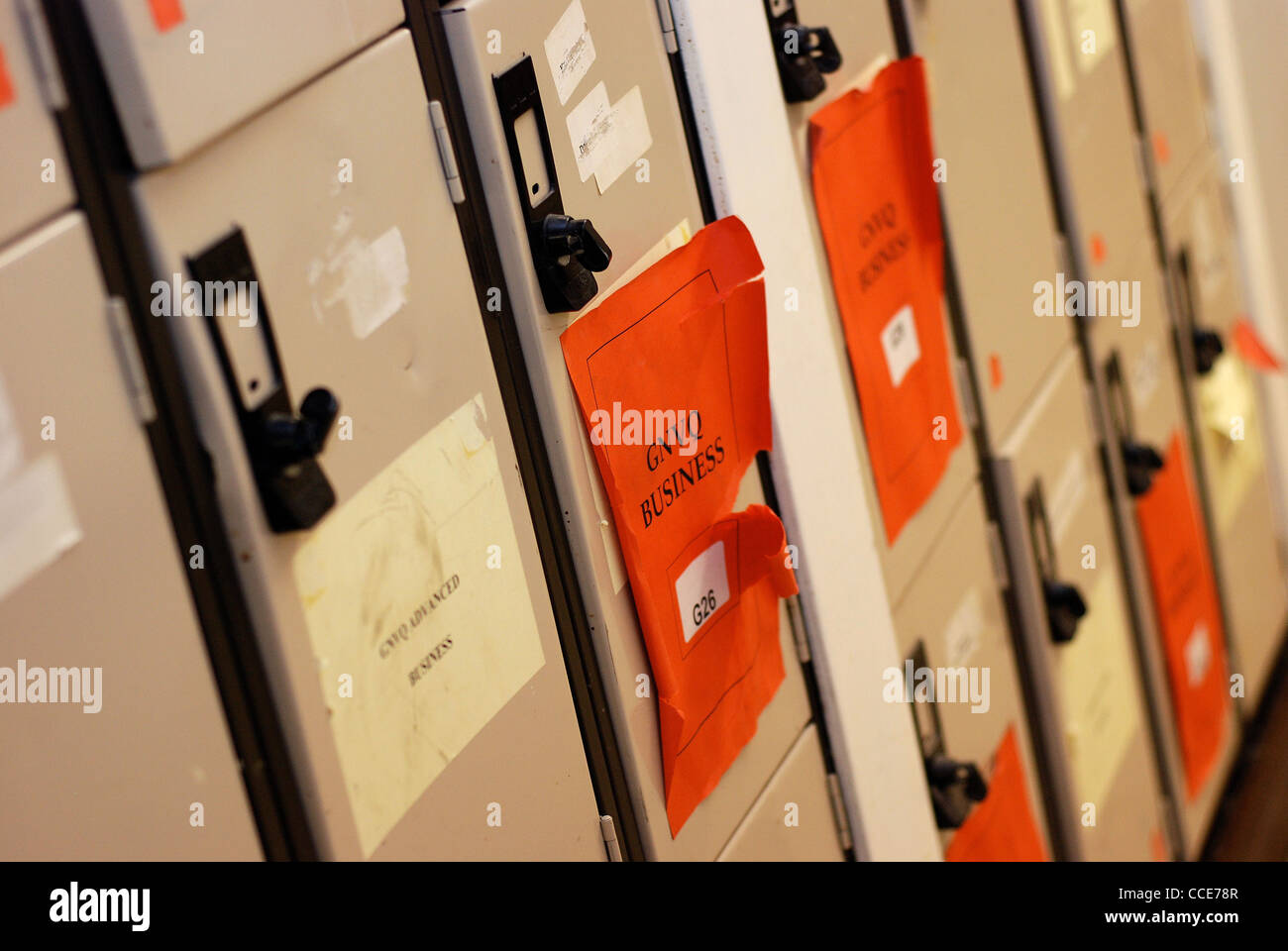 Bank of lockers with scruffy signs on them Stock Photo - Alamy