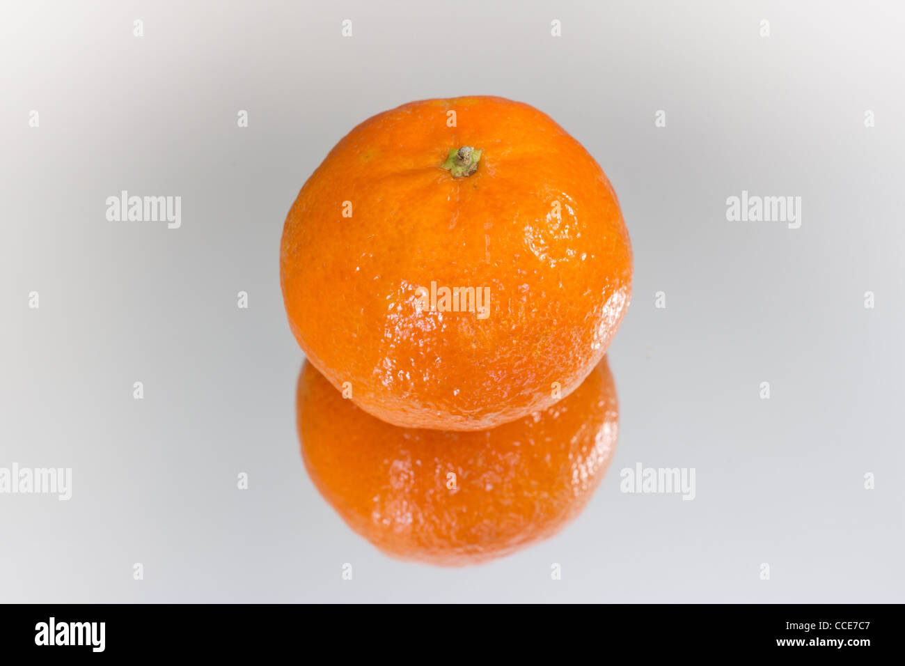 Reflections of an Orange Stock Photo - Alamy
