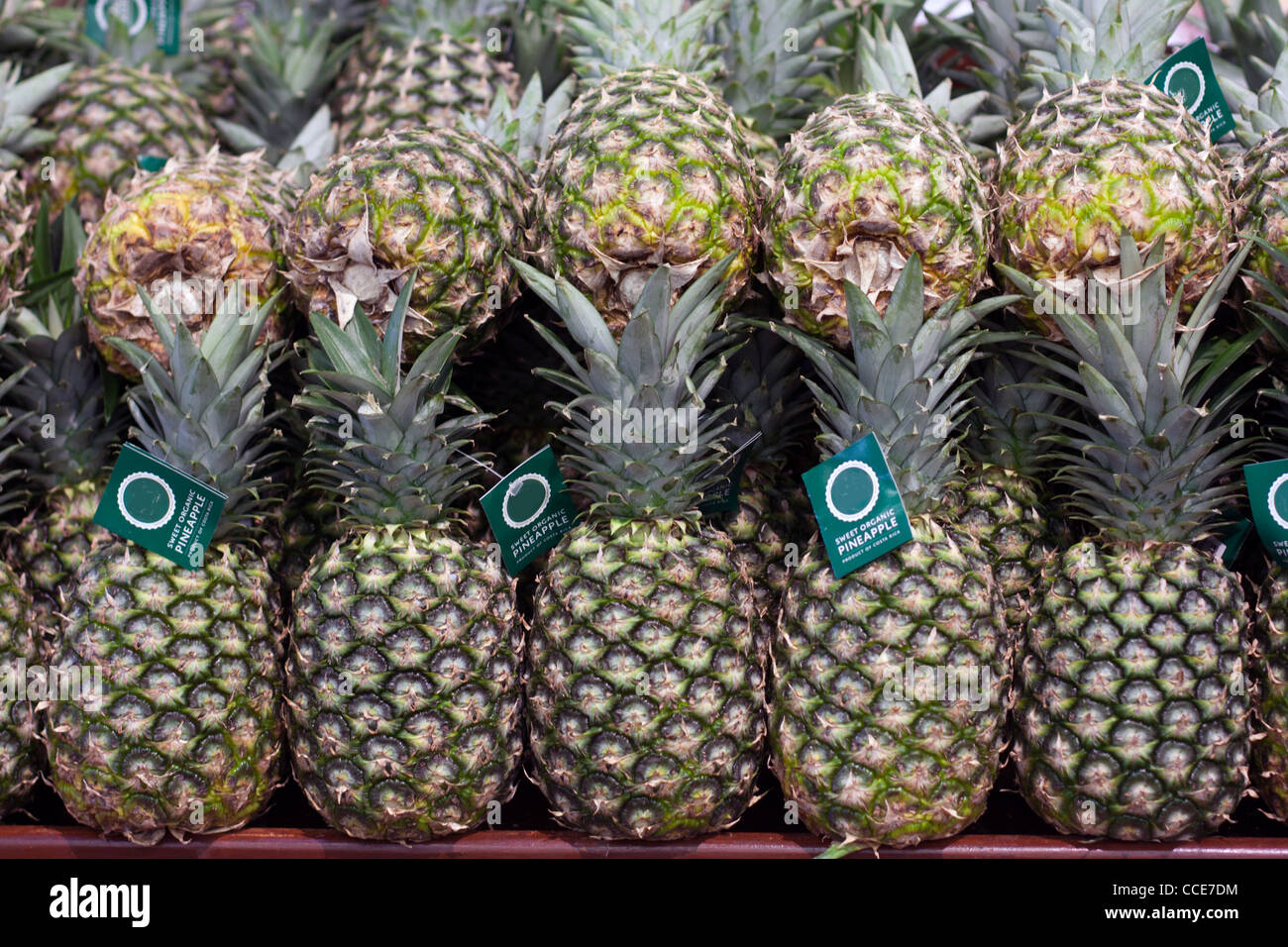 Pineapples on store shelf hi-res stock photography and images - Alamy