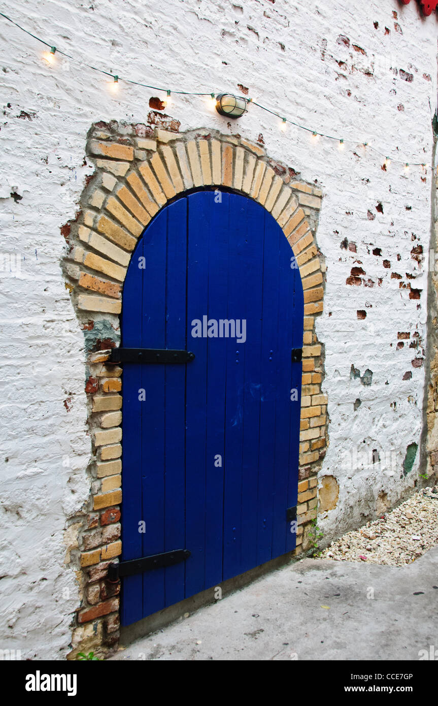 Blue shuttered doors hi-res stock photography and images - Alamy