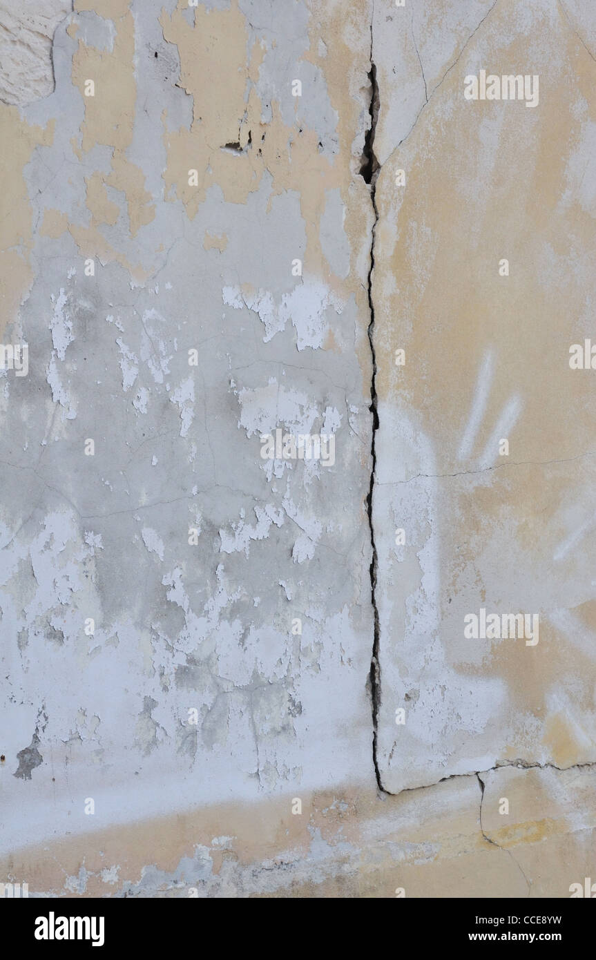 Chipped off paint and cracked wall plaster Stock Photo - Alamy