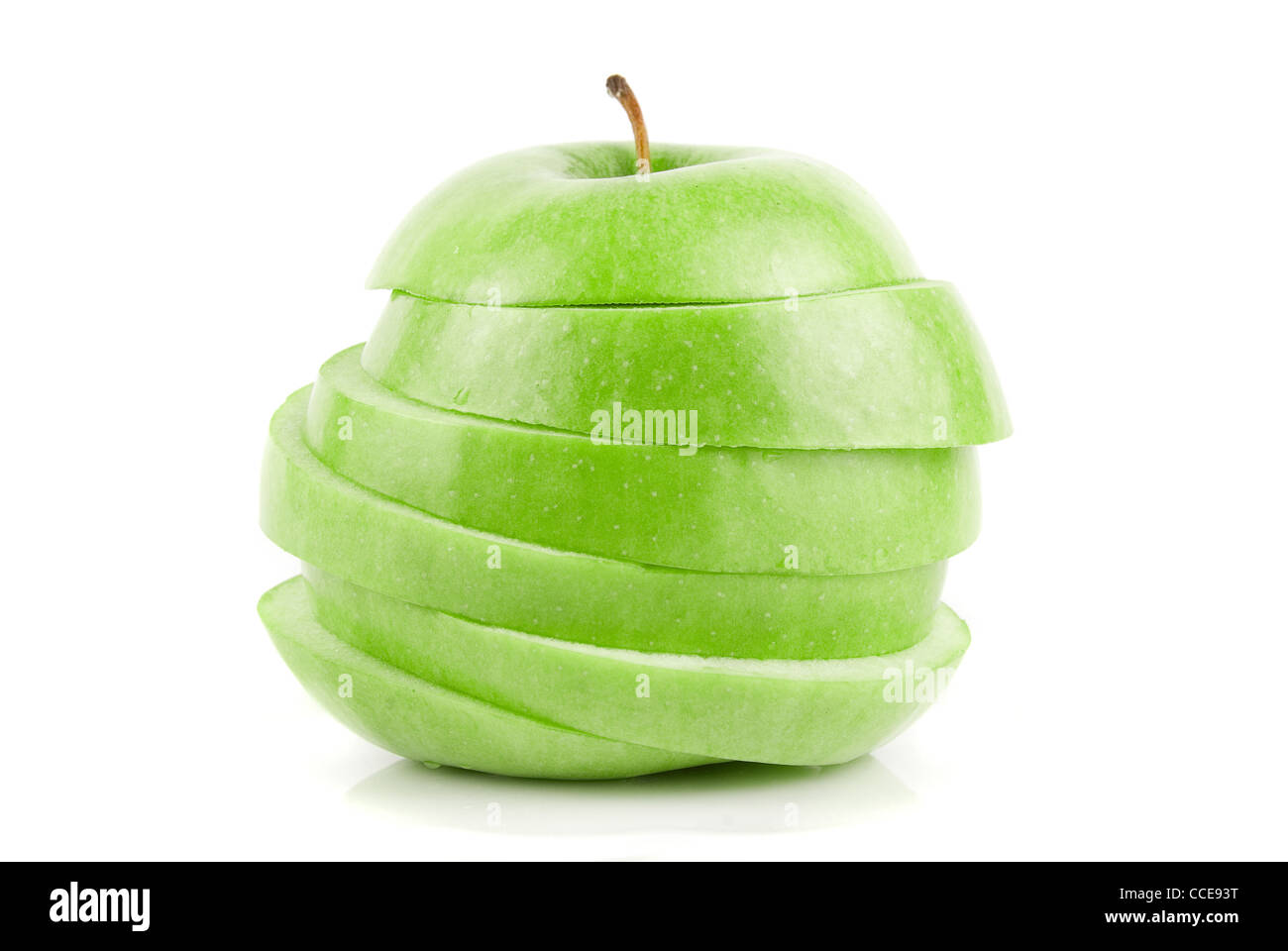 Sliced green apple isolated on white background Stock Photo - Alamy