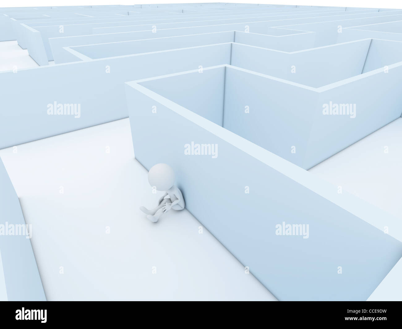 A person stuck in a maze trying to think of a way out Stock Photo - Alamy
