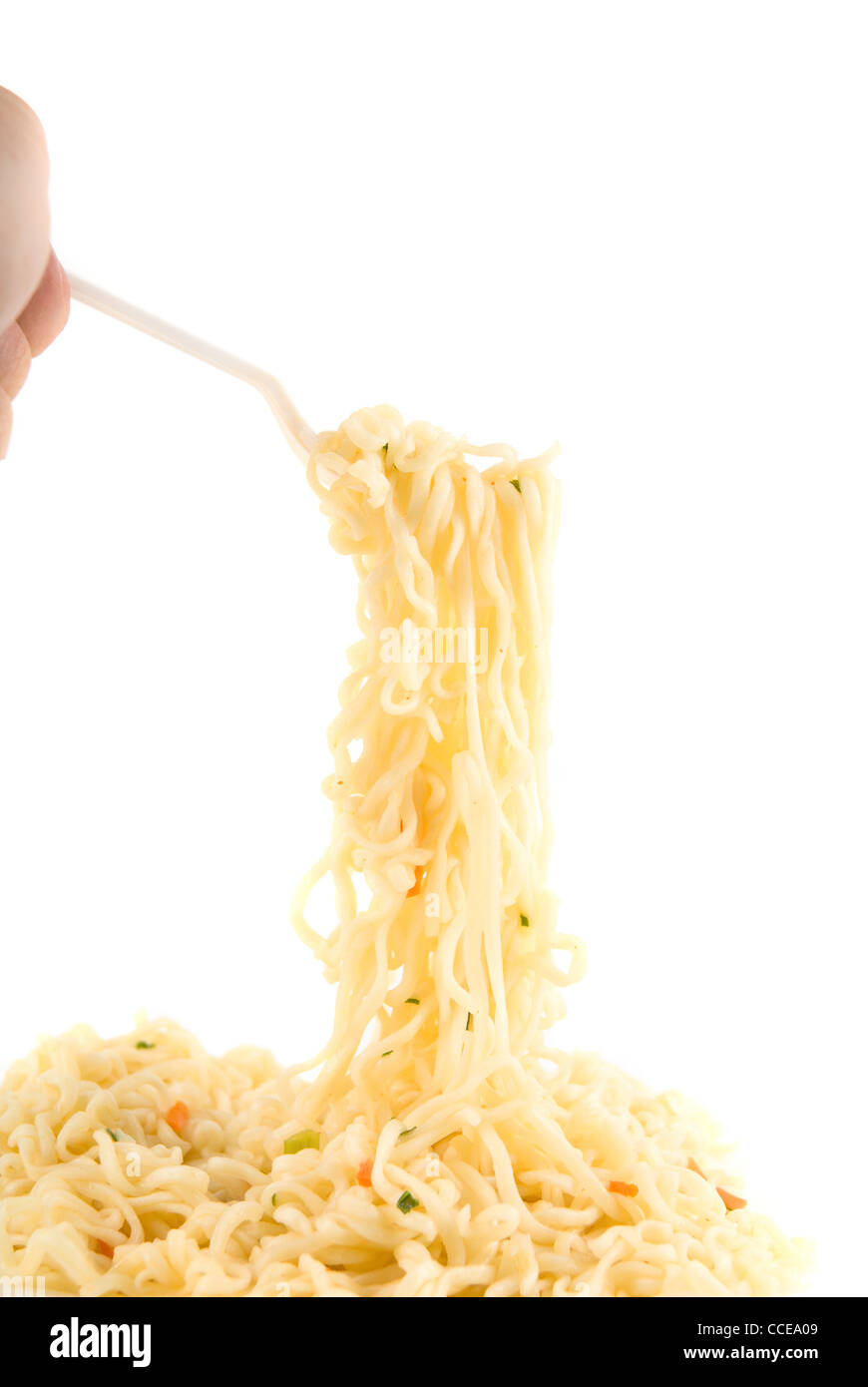 spaghetti at fork isolated on white background Stock Photo - Alamy