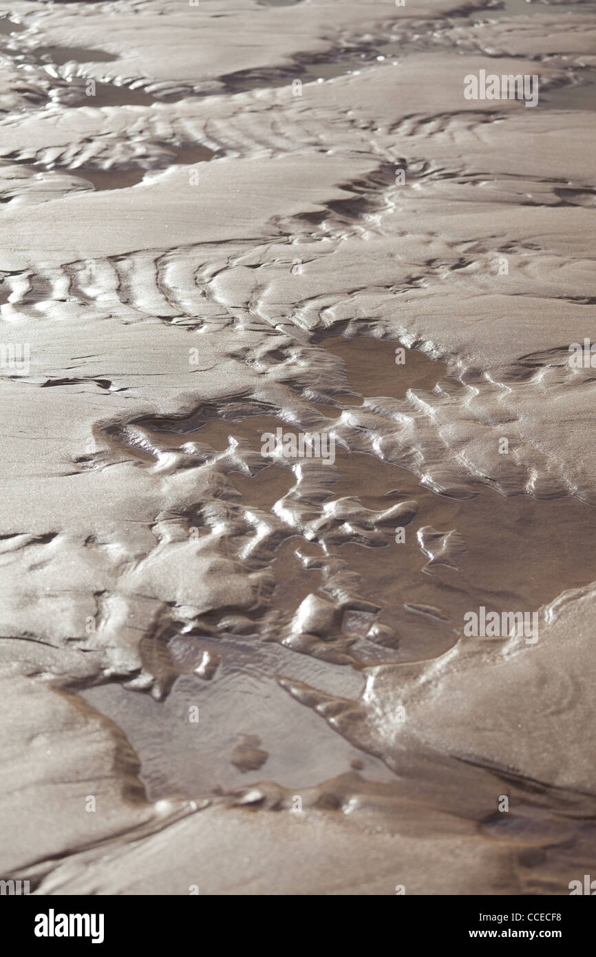 Ripples in the sand caused by the sea Stock Photo - Alamy