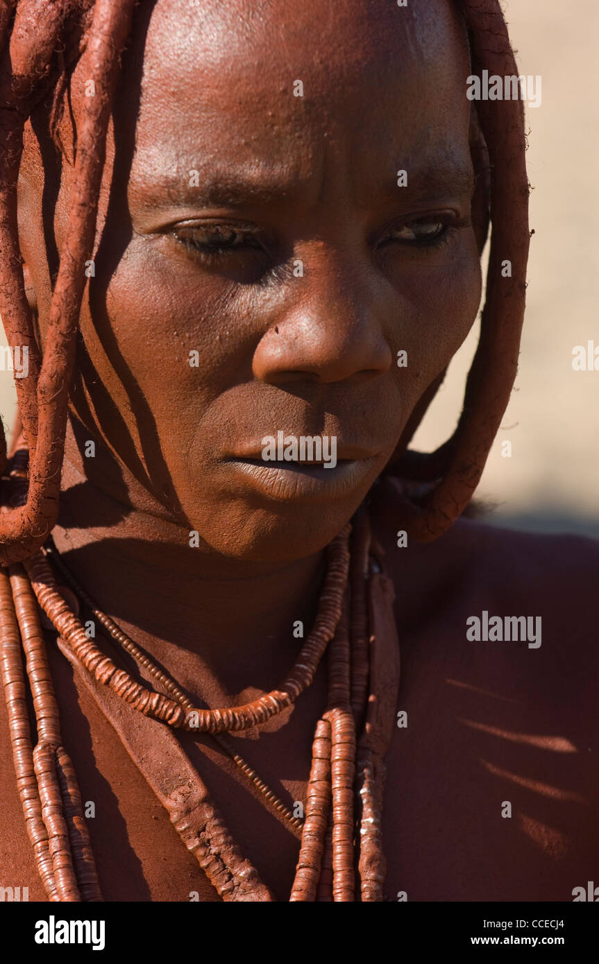 The Himba are a tiny group in Namibia, who dust their skin with a red ...
