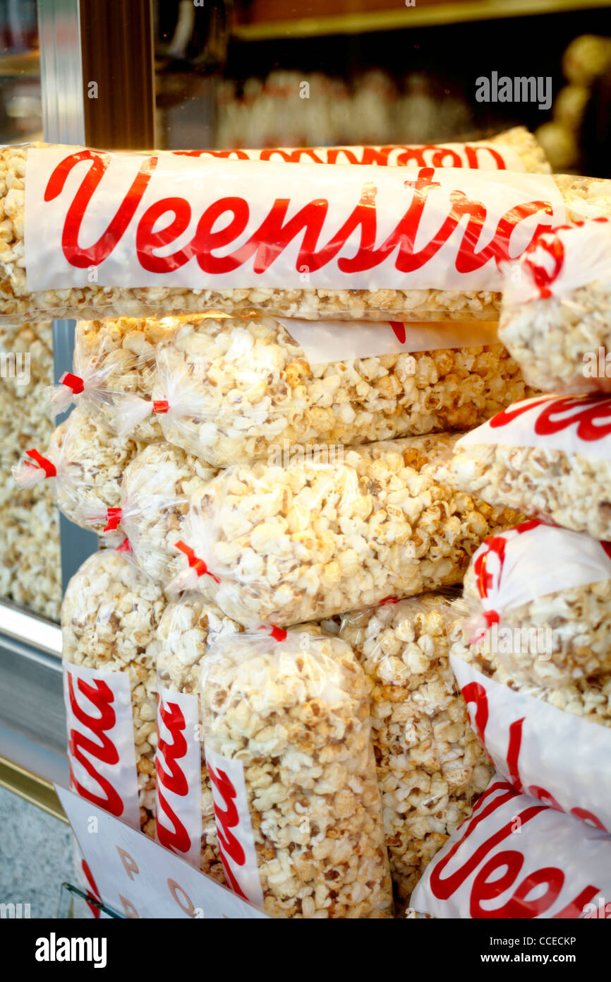 close up of window display with sweet popcorn packages at german mobile ...