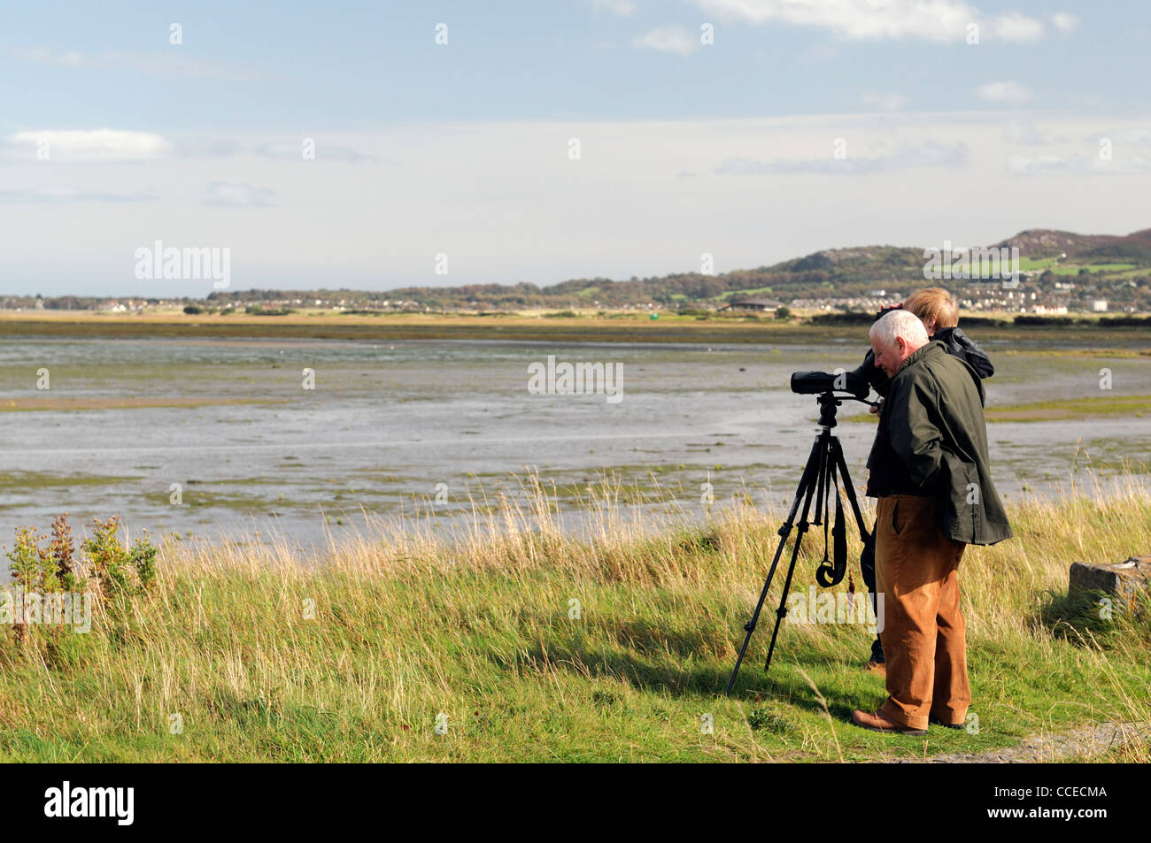 Two people birdwatching bird watch watching watchers twitchers near ...