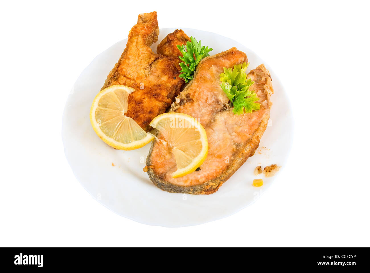 Tasty red fish dish isolated on a white background Stock Photo - Alamy