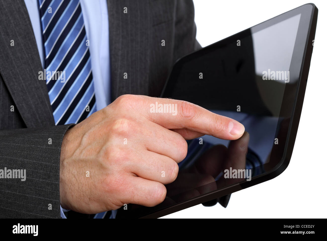 Finger pointing on digital tablet Stock Photo - Alamy