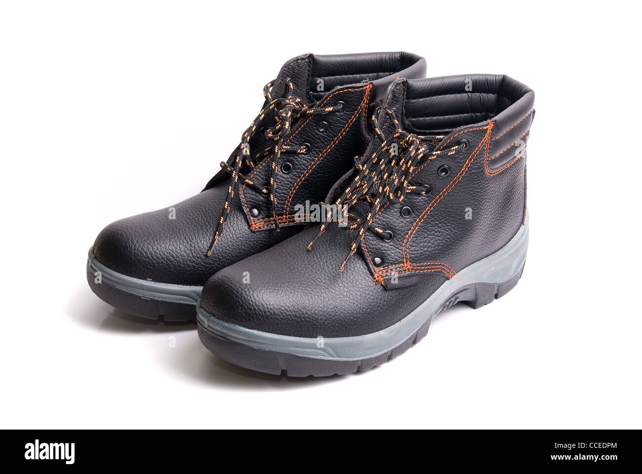 modern working boots isolated on a white background Stock Photo - Alamy