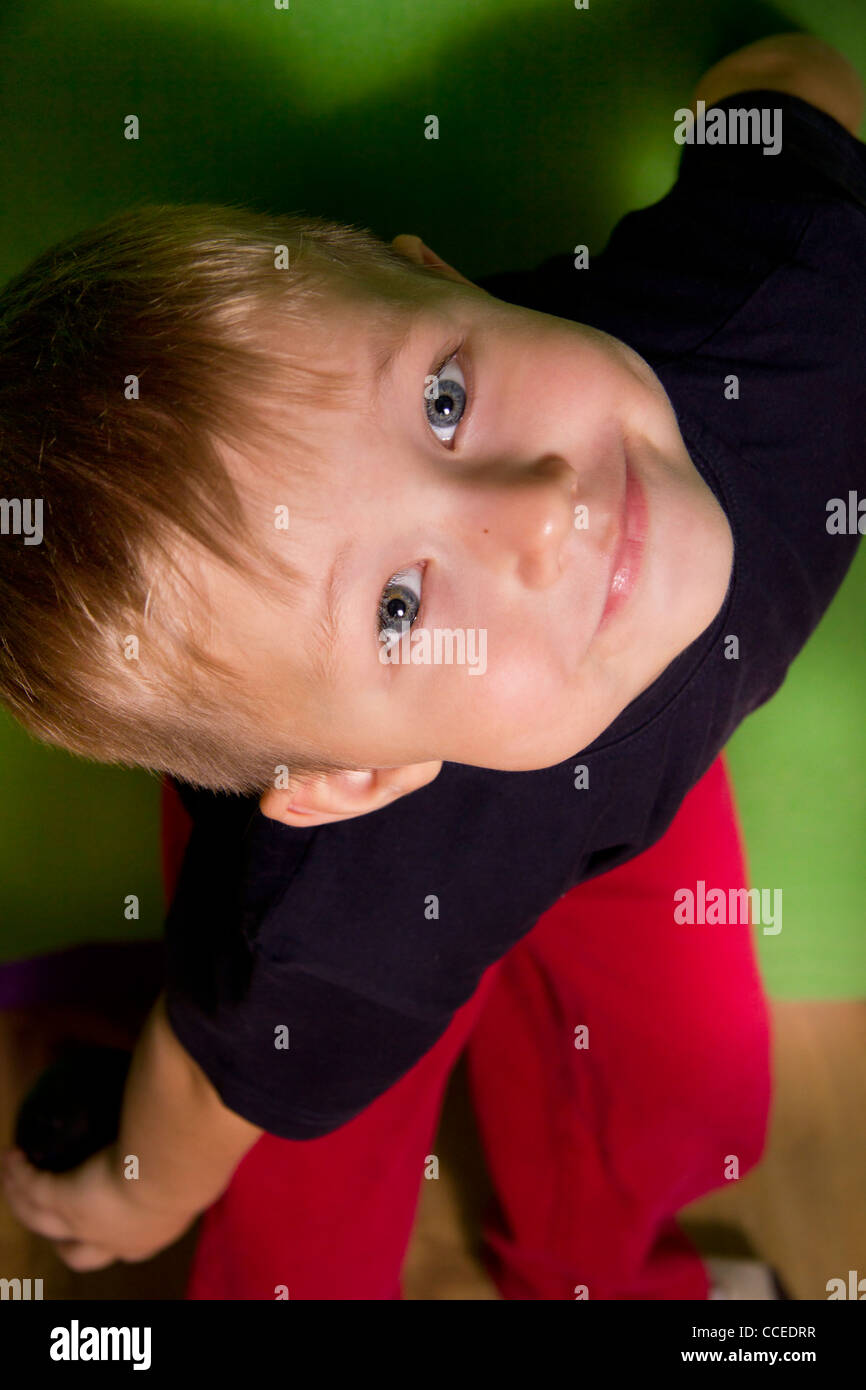 Photo of adorable young boy looking at camera Stock Photo - Alamy