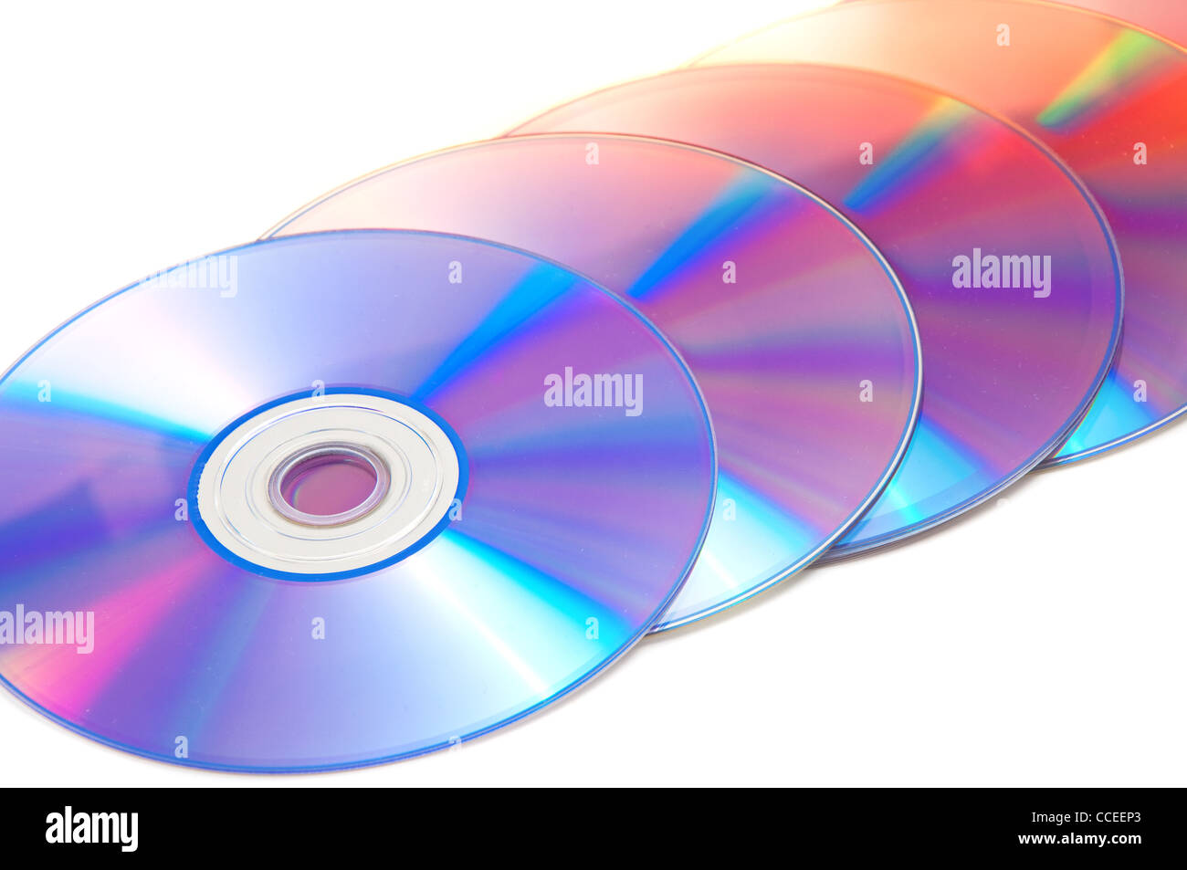 A pile of dvd discs over a white background Stock Photo - Alamy