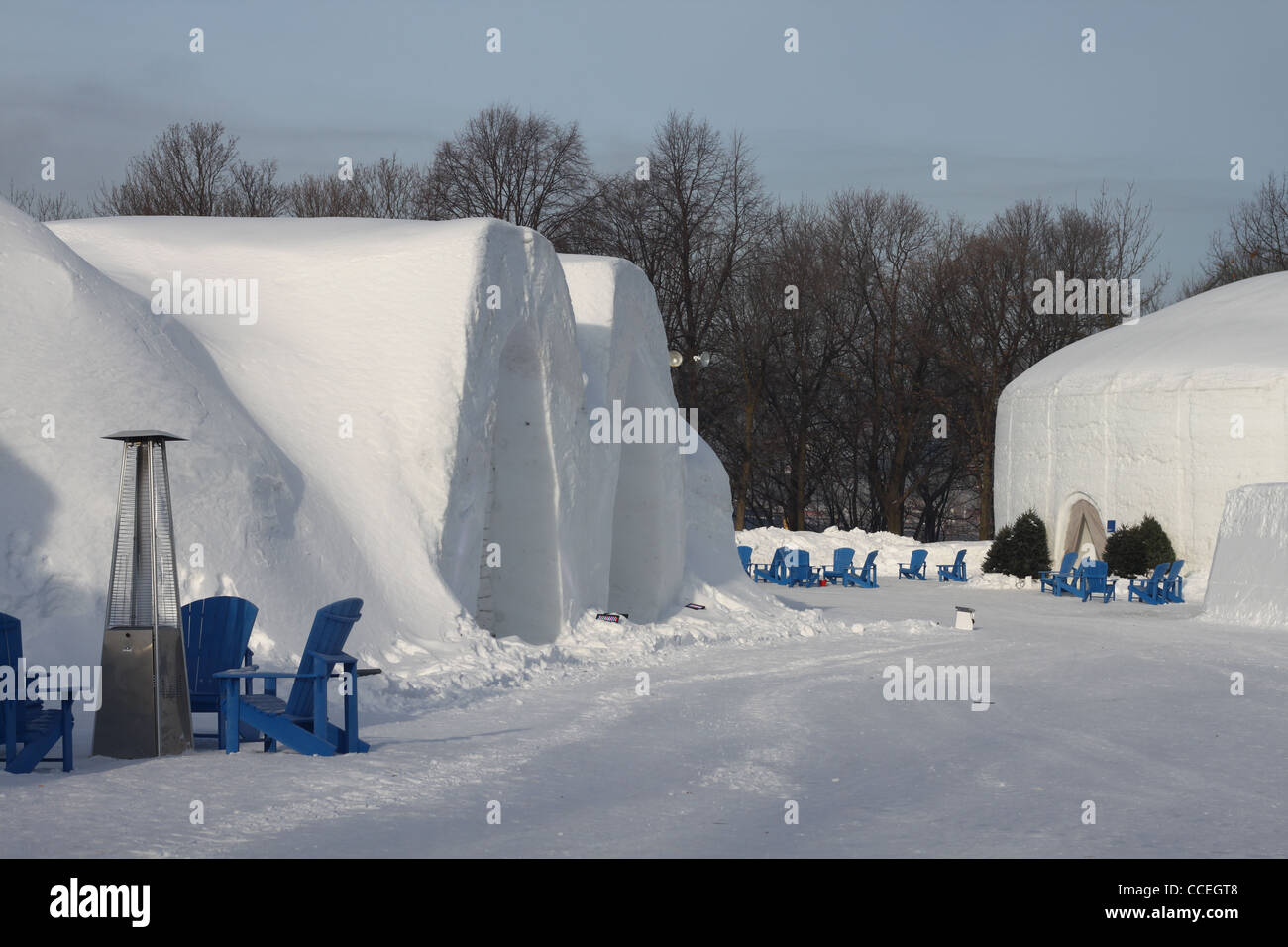 Snow village Montreal with snow architecture and blue Adirondack chairs ...