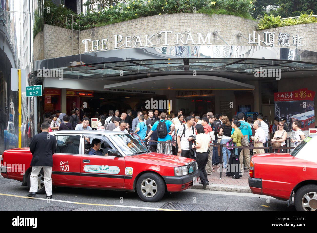 taxi stand outside busy entrance to the peak tram in hong kong hksar ...