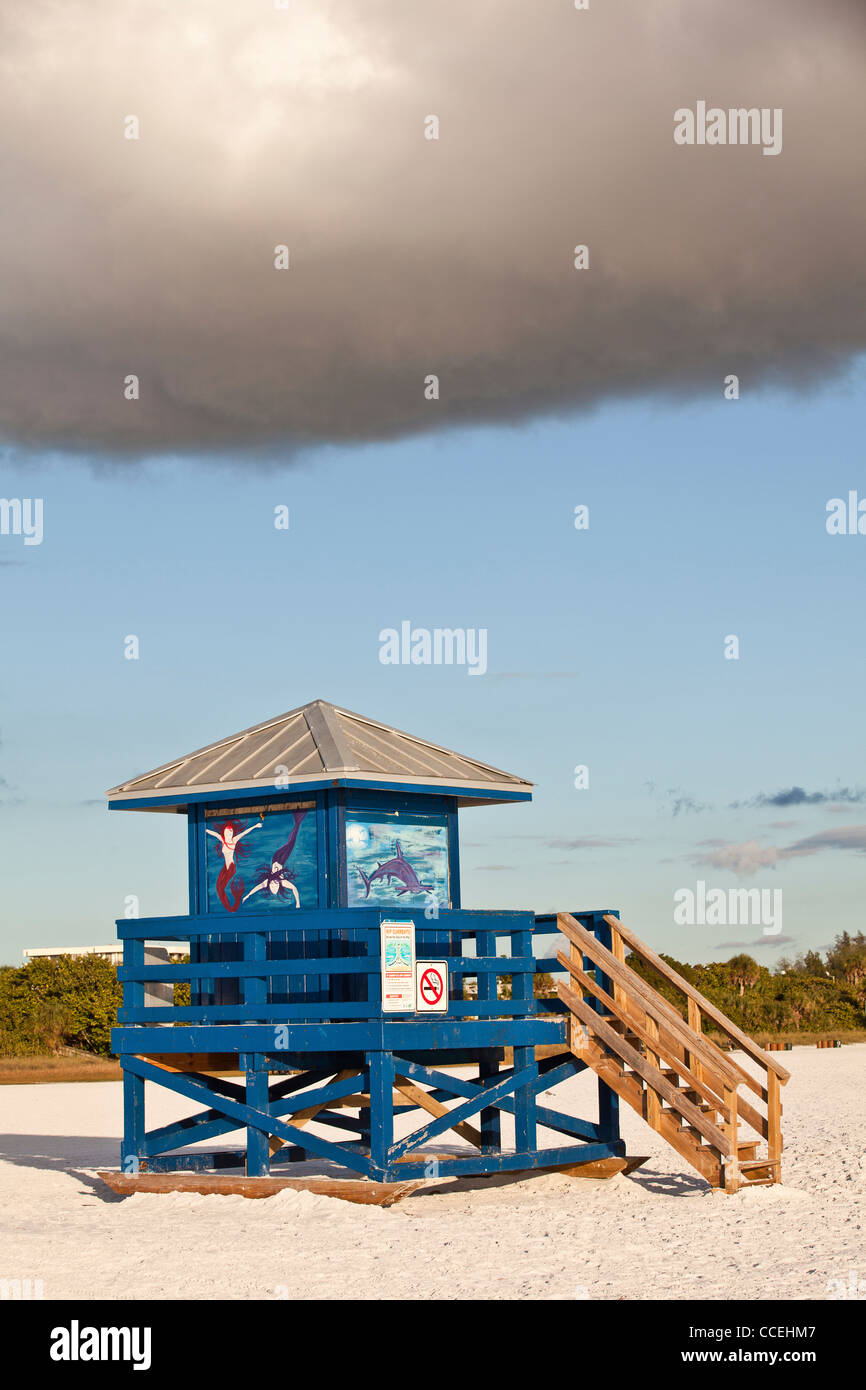 Beach patrol and yellow lifeguard station on famed white powder sand ...