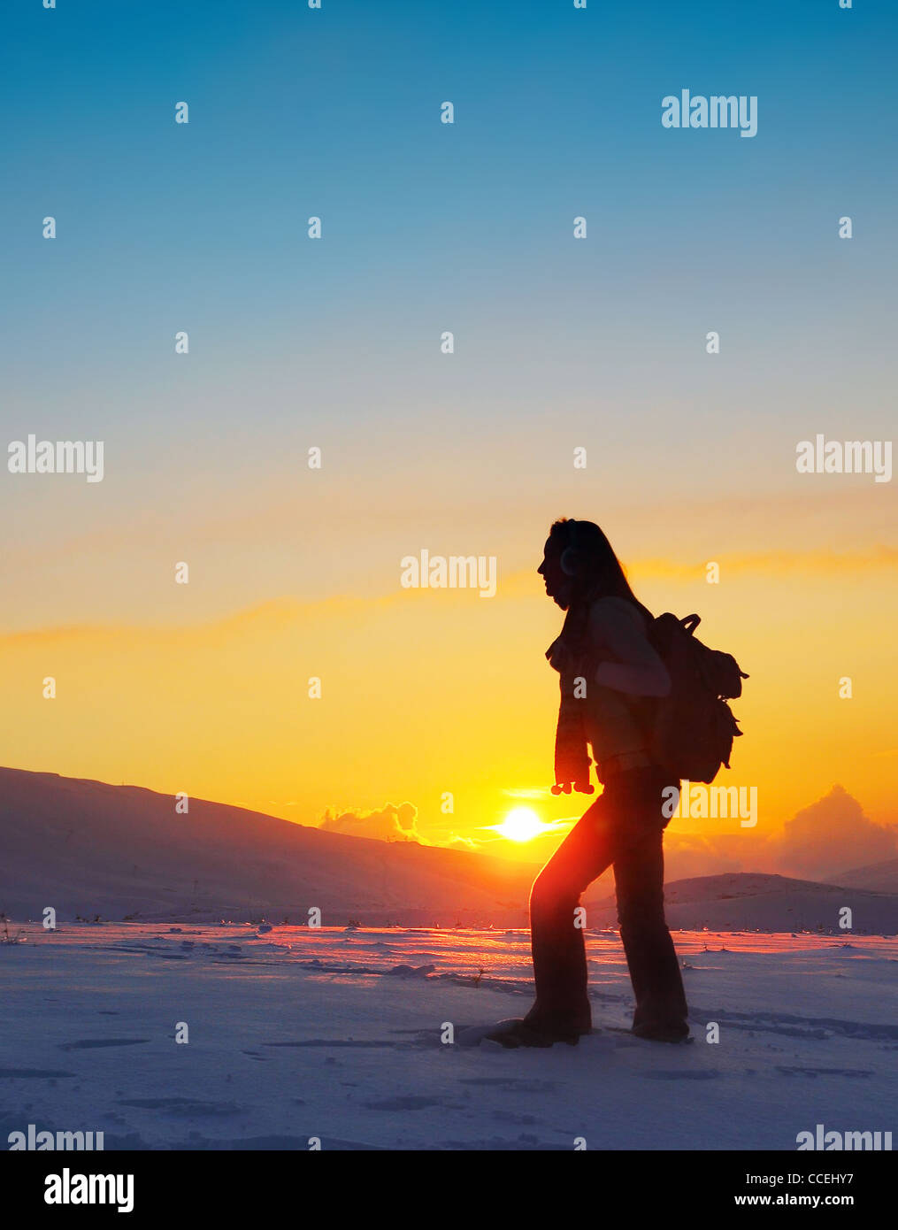 Winter sun woman walking shadow hi-res stock photography and images - Alamy