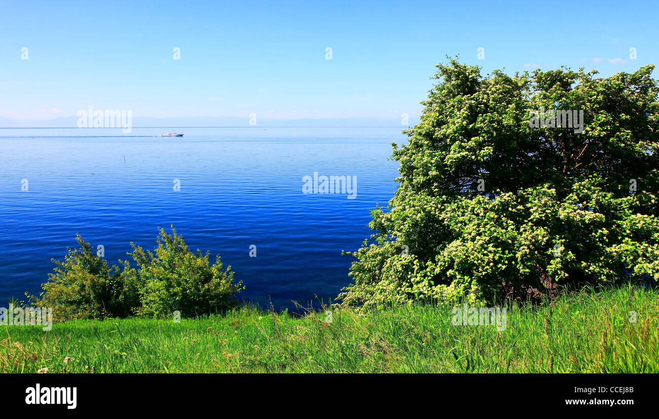 Lake Baikal, summer. Ship in the middle of the Lake Baikal Stock Photo ...