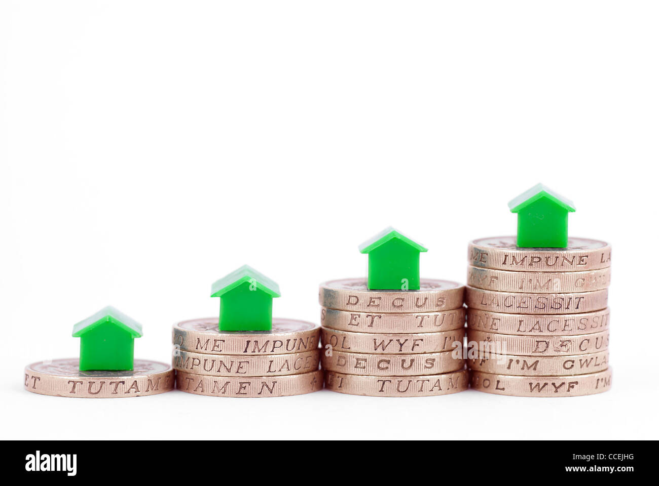 Plastic houses stacks money hi-res stock photography and images - Alamy