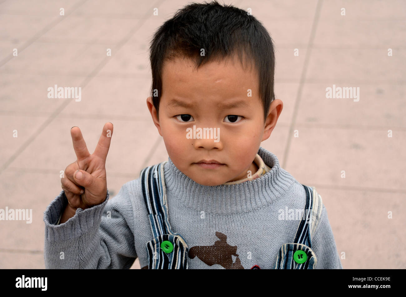 Poor china child hi-res stock photography and images - Alamy