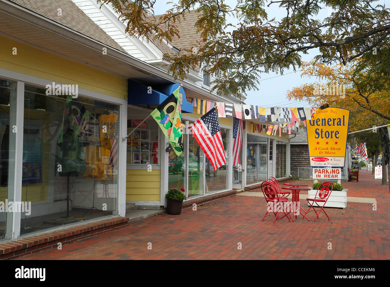 Wide brick sidewalk in front of a store on Cape Cod, Massachusetts ...